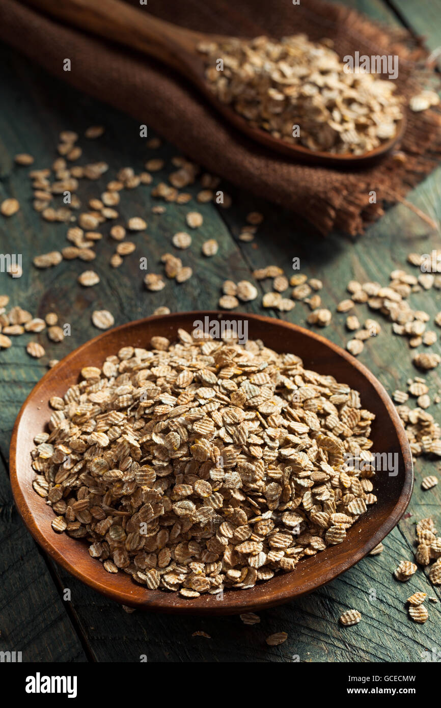 Organic Rolled Rye Flakes in a Bowl Stock Photo - Alamy