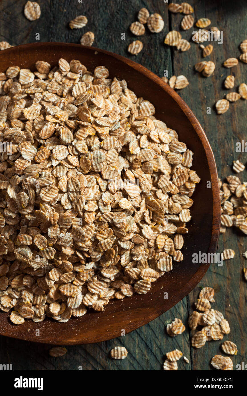 Organic Rolled Rye Flakes in a Bowl Stock Photo - Alamy