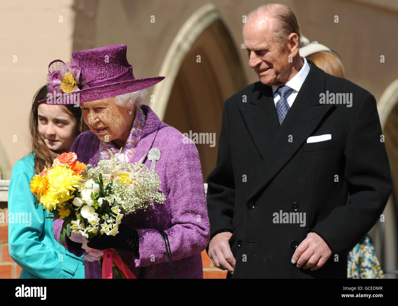 Queen Elizabeth II and the Duke of Edinburgh (right) leave after ...