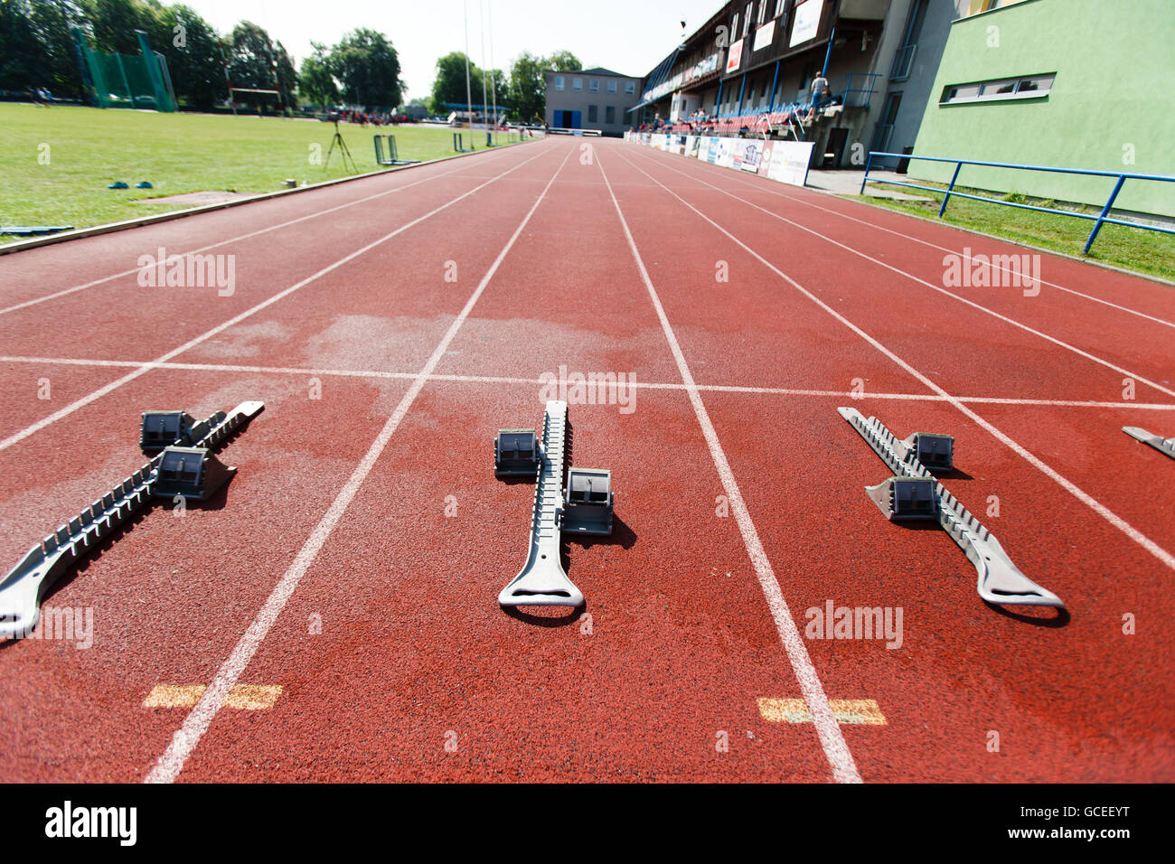 Athletic track. Athletics starting blocks (Shallow DOF Stock Photo - Alamy