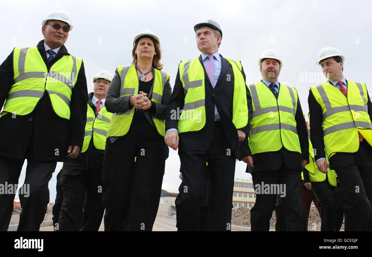 Prime Minister Gordon Brown (centre) and his wife Sarah walk to ...