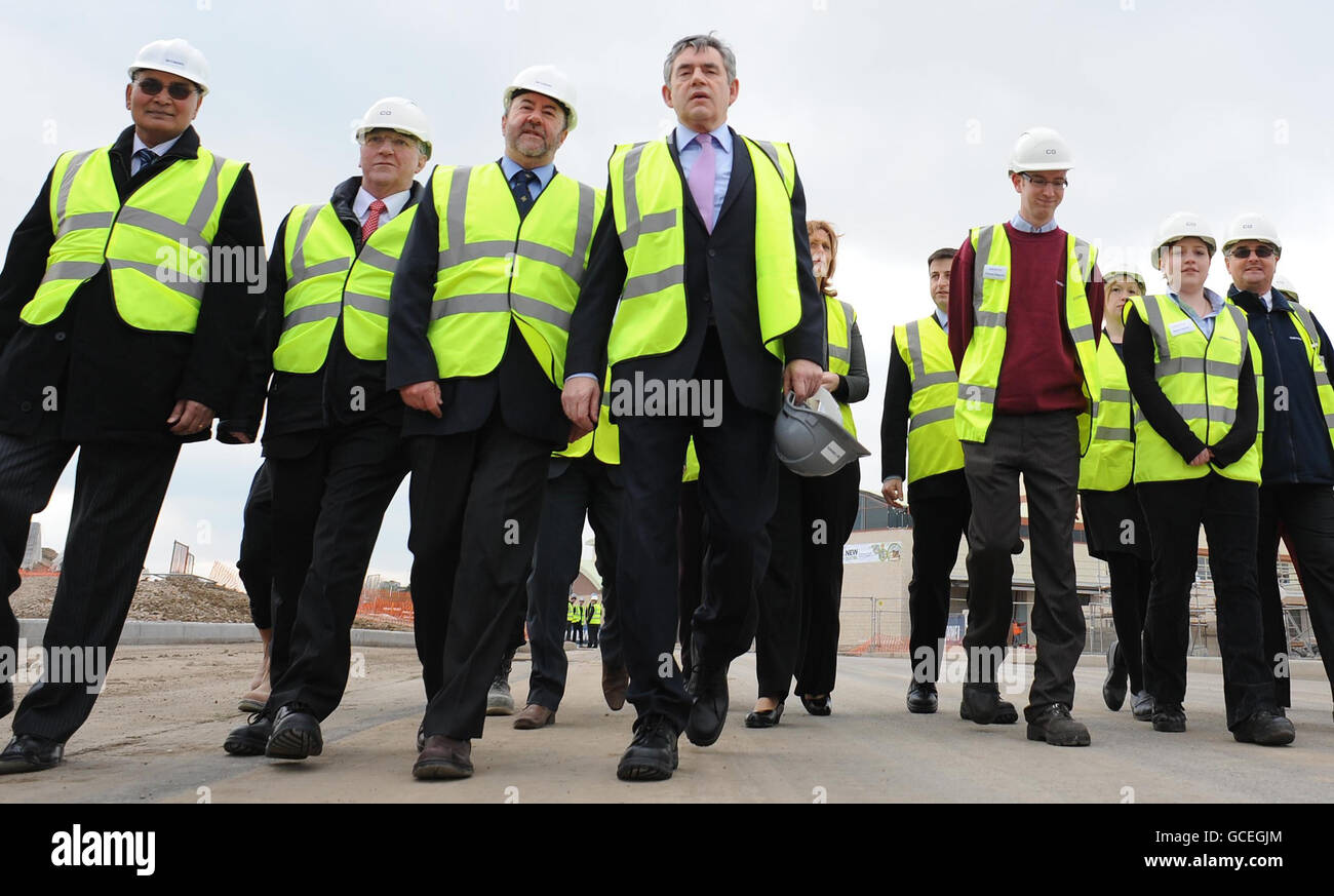 Prime Minister Gordon Brown (centre) and his wife Sarah walk to ...
