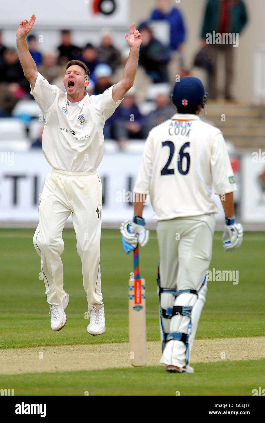 Durham's Callum Thorp (left) celebrates the wicket of Essex's John ...