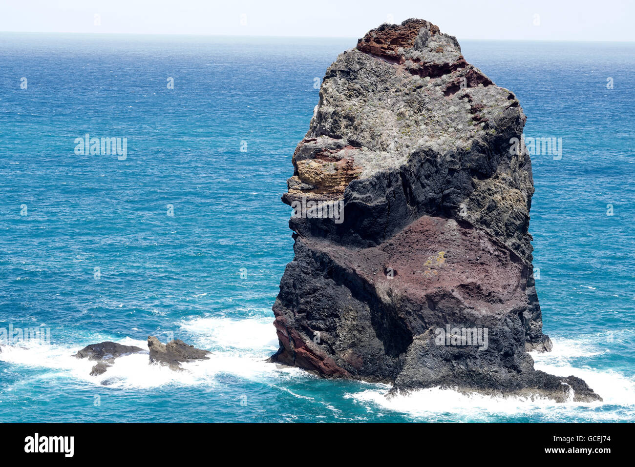 closeup of a rock in the ocean waves Stock Photo - Alamy