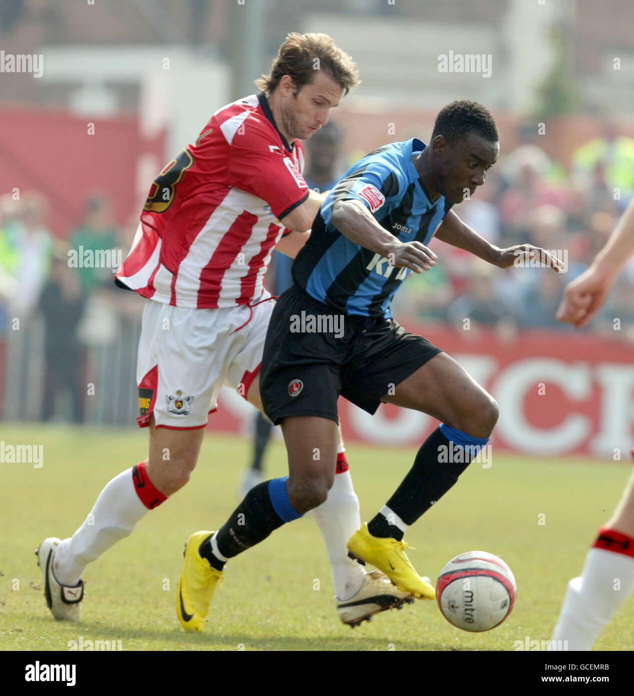 Charlton Athletic's Lloyd Sam gets away from Exeter City's Joe Burnell ...