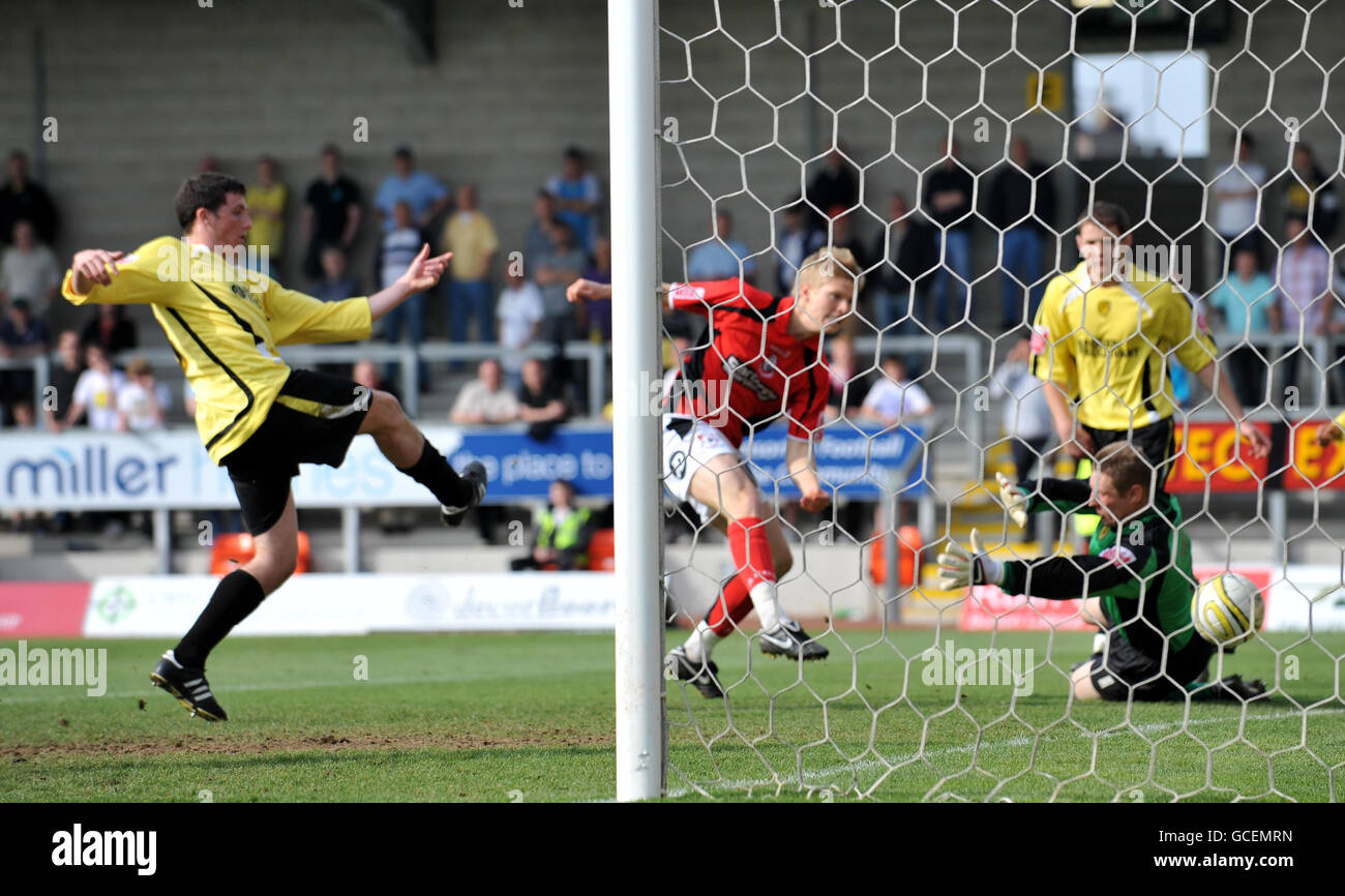 Football full length action kicking leg raised hi-res stock photography ...