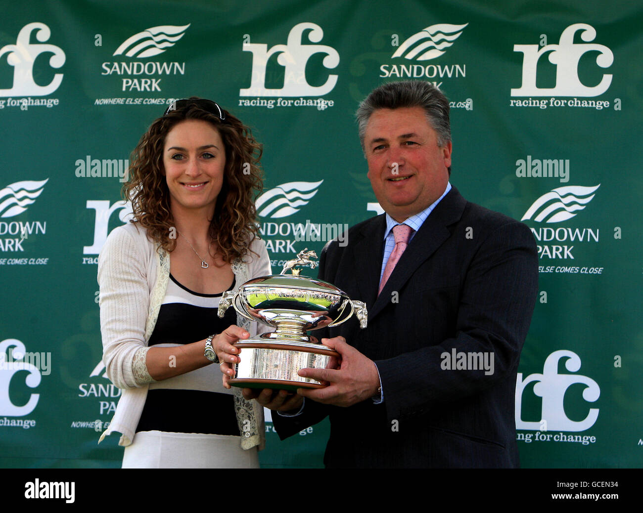 Athlete Amy Williams presents the BHA Champion Trainer trophy to Paul ...