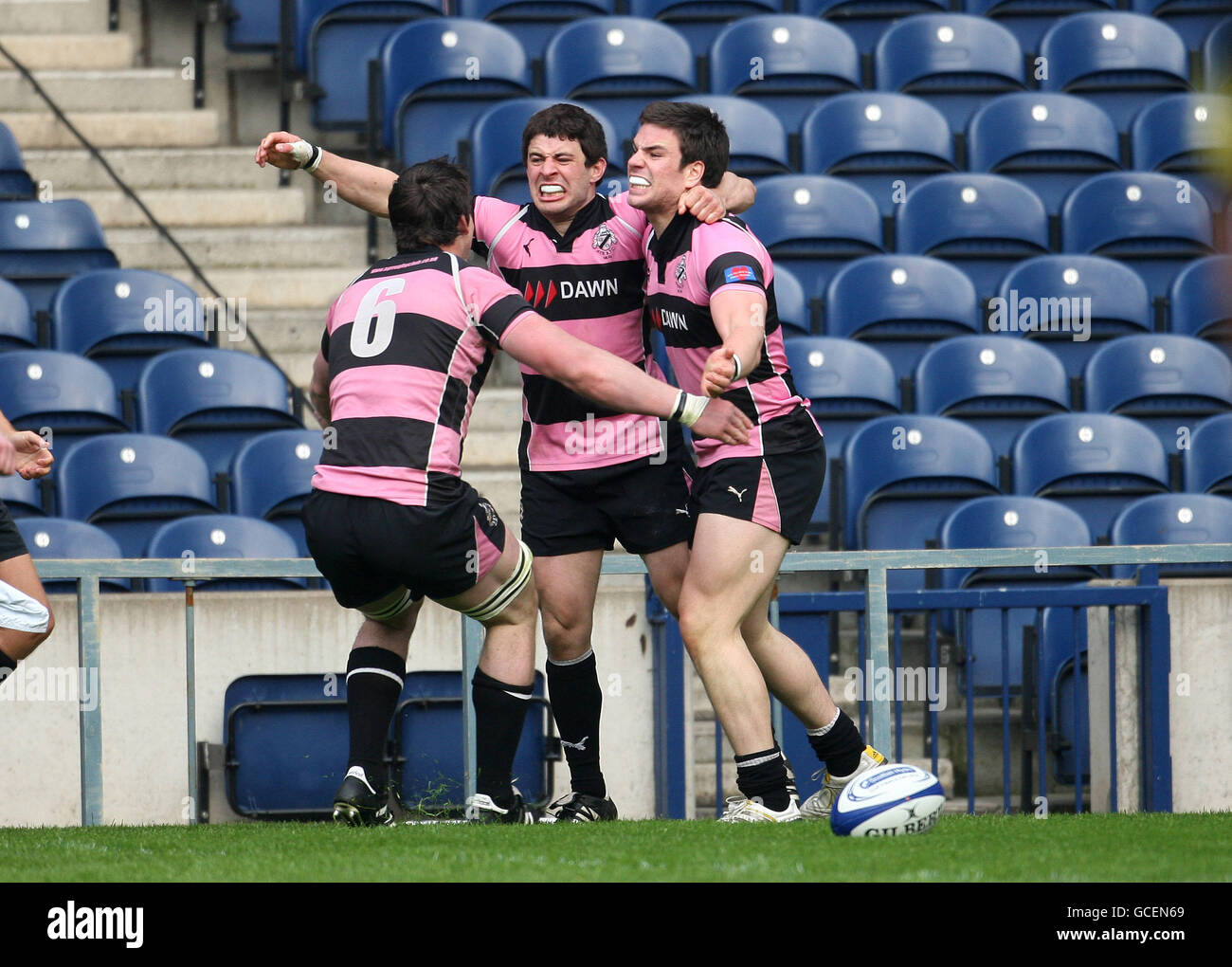 Ayr's Andrew Wilson (centre) celebartes scoring a try during the ...