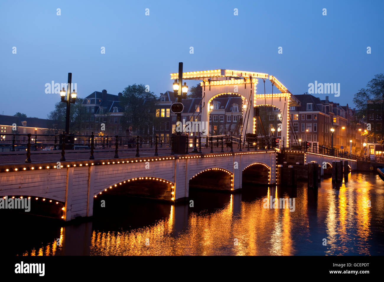 Magere Brug bridge over the Amstel river, Amsterdam, Holland ...