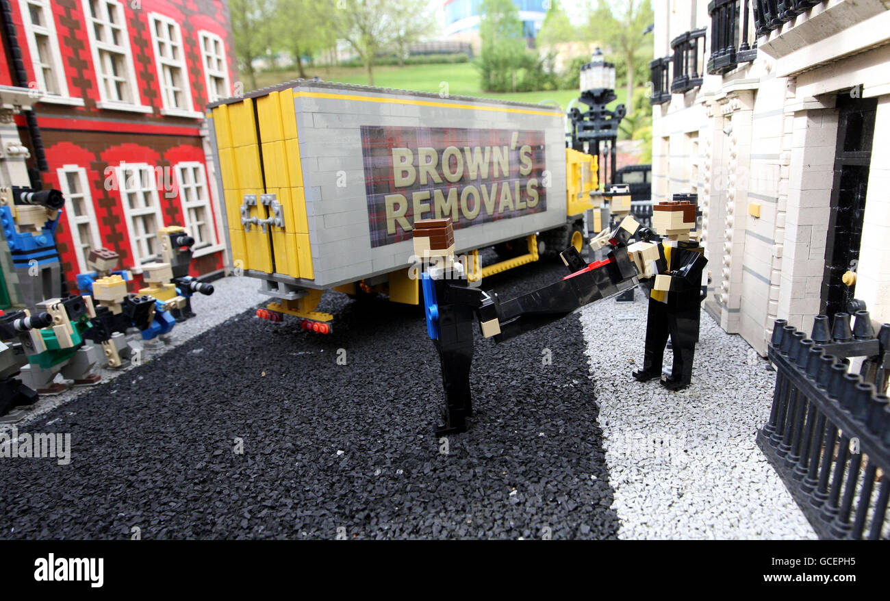 Mini lego figures of Nick Clegg and David Cameron carrying Gordon Brown ...