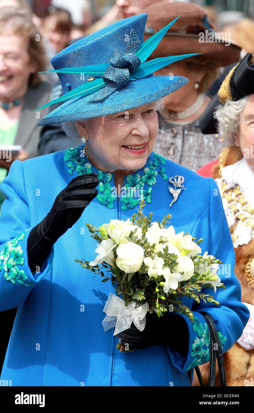 Queen Elizabeth II waves as she meets members of the public in ...