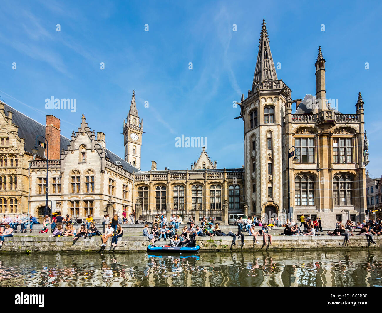 Leie River and promenade on the Graslei, with old guild houses and old ...