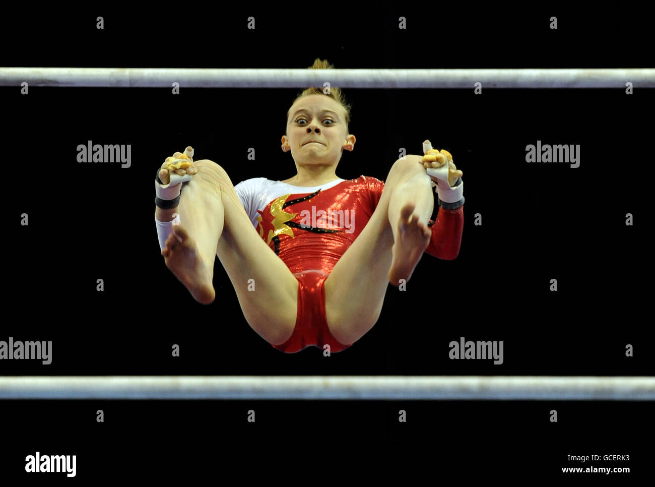 German's Janine Berger competes on the asymmetric bars during the Women ...