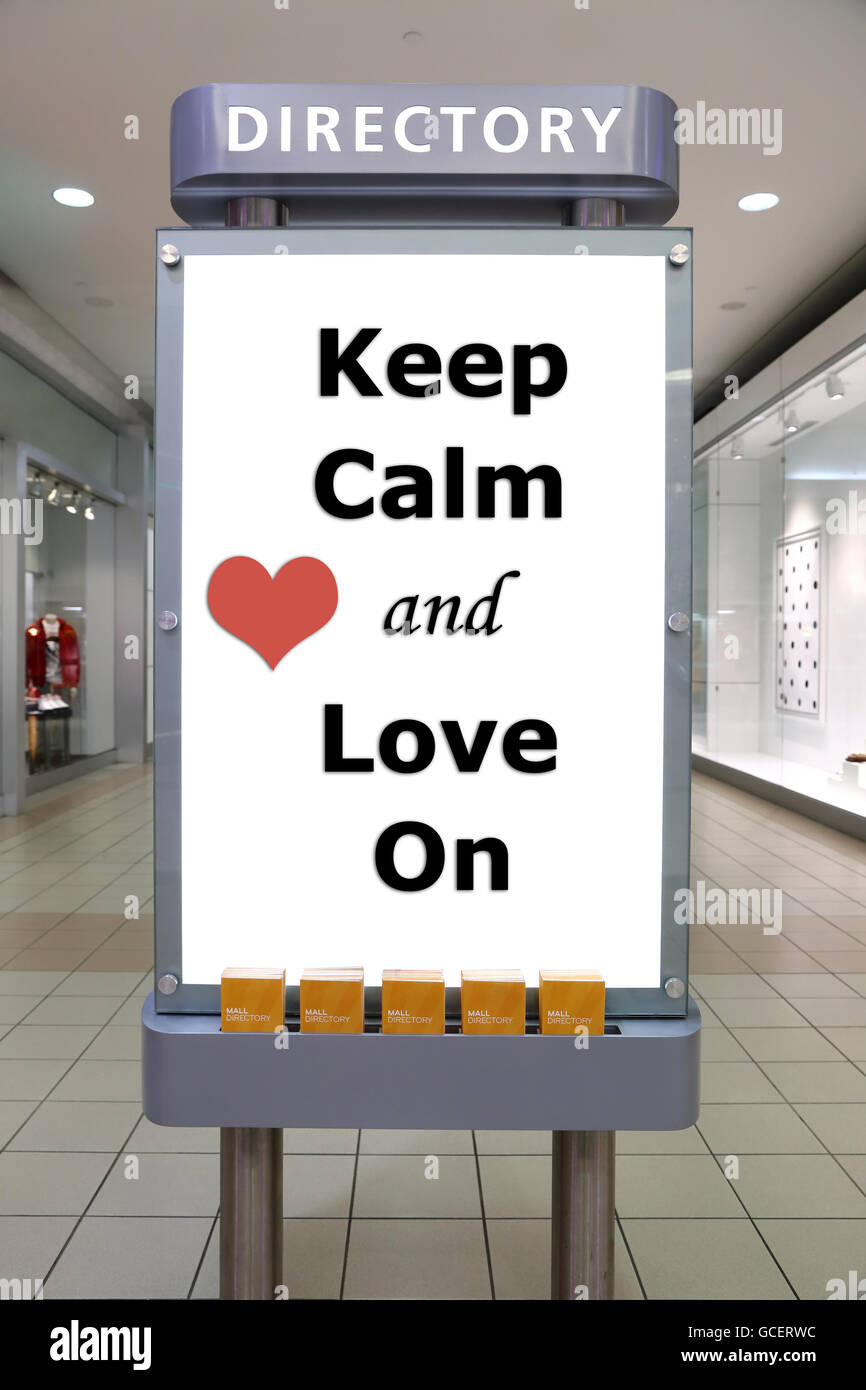 Keep calm and love on sign inside shopping mall Stock Photo - Alamy