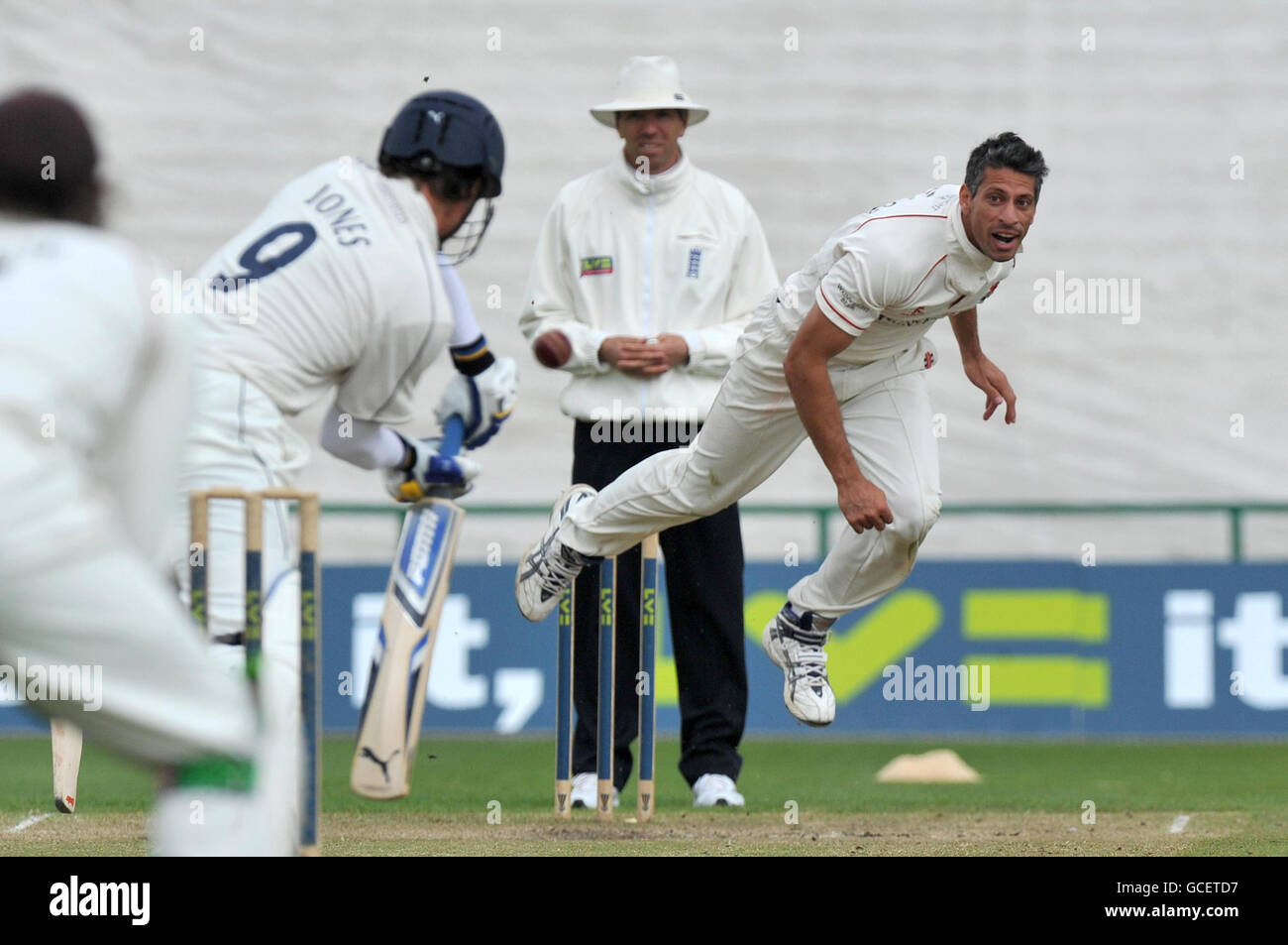 Lancashire's Sajid Mahmood (right) takes the wicket of Kent's Geraint ...