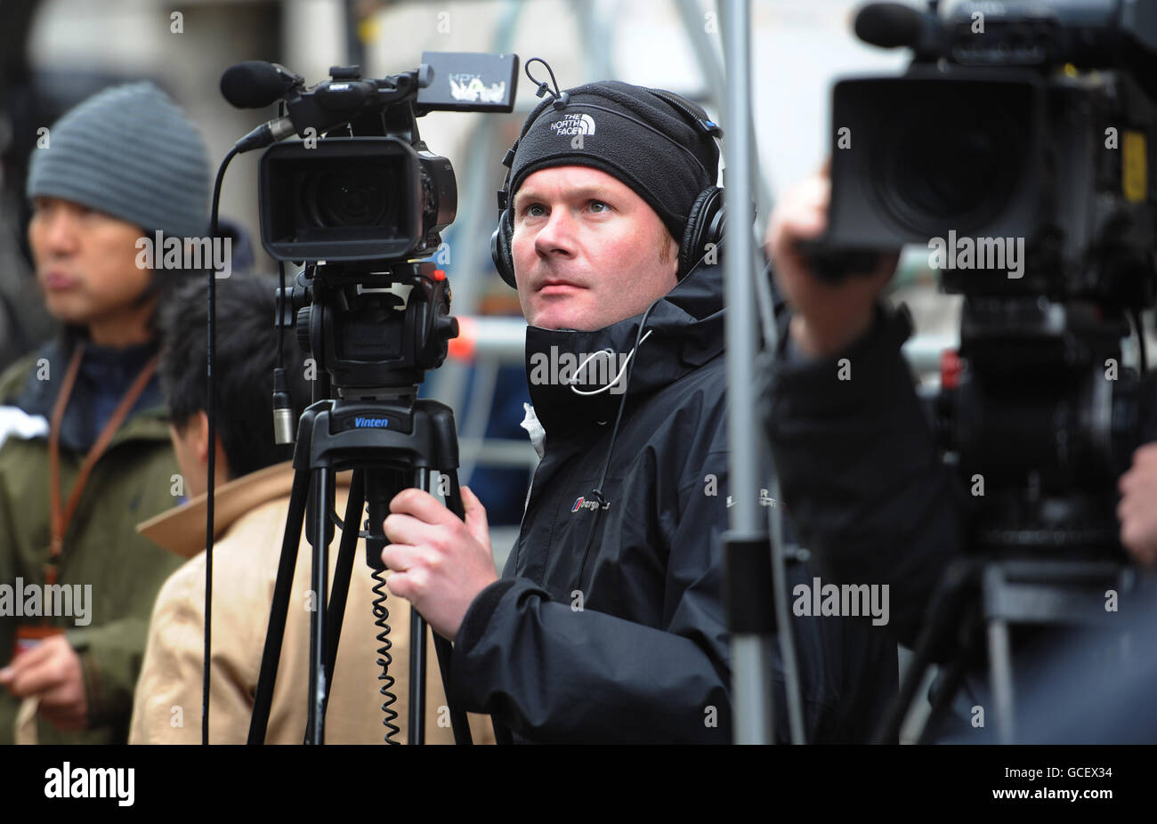Press Association video journalist Charles Murray is seen at work ...