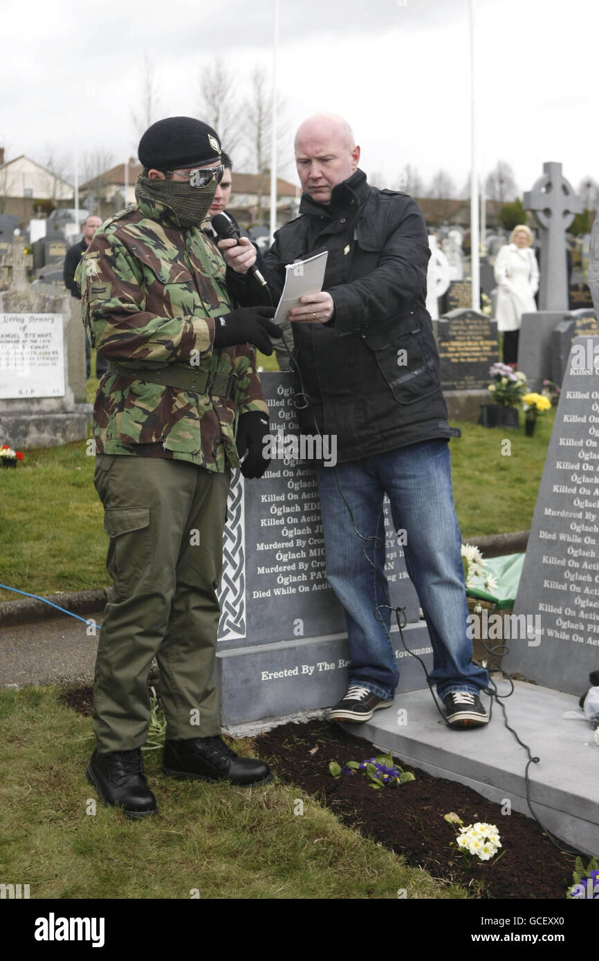 A masked member of the Real IRA reads a statement at a Republican ...