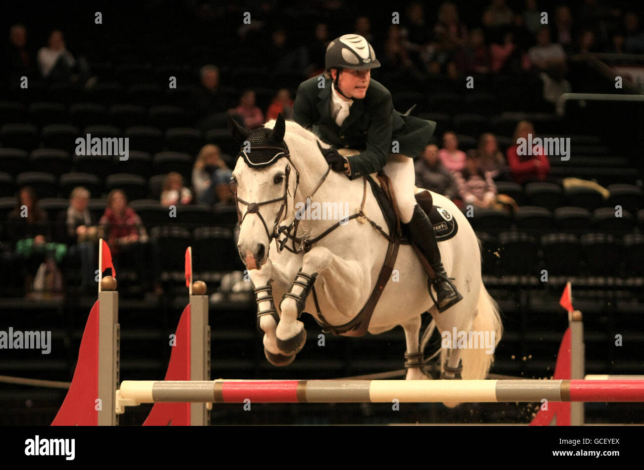 Alex Duffy on Courtown competes during the British Open Show Jumping ...