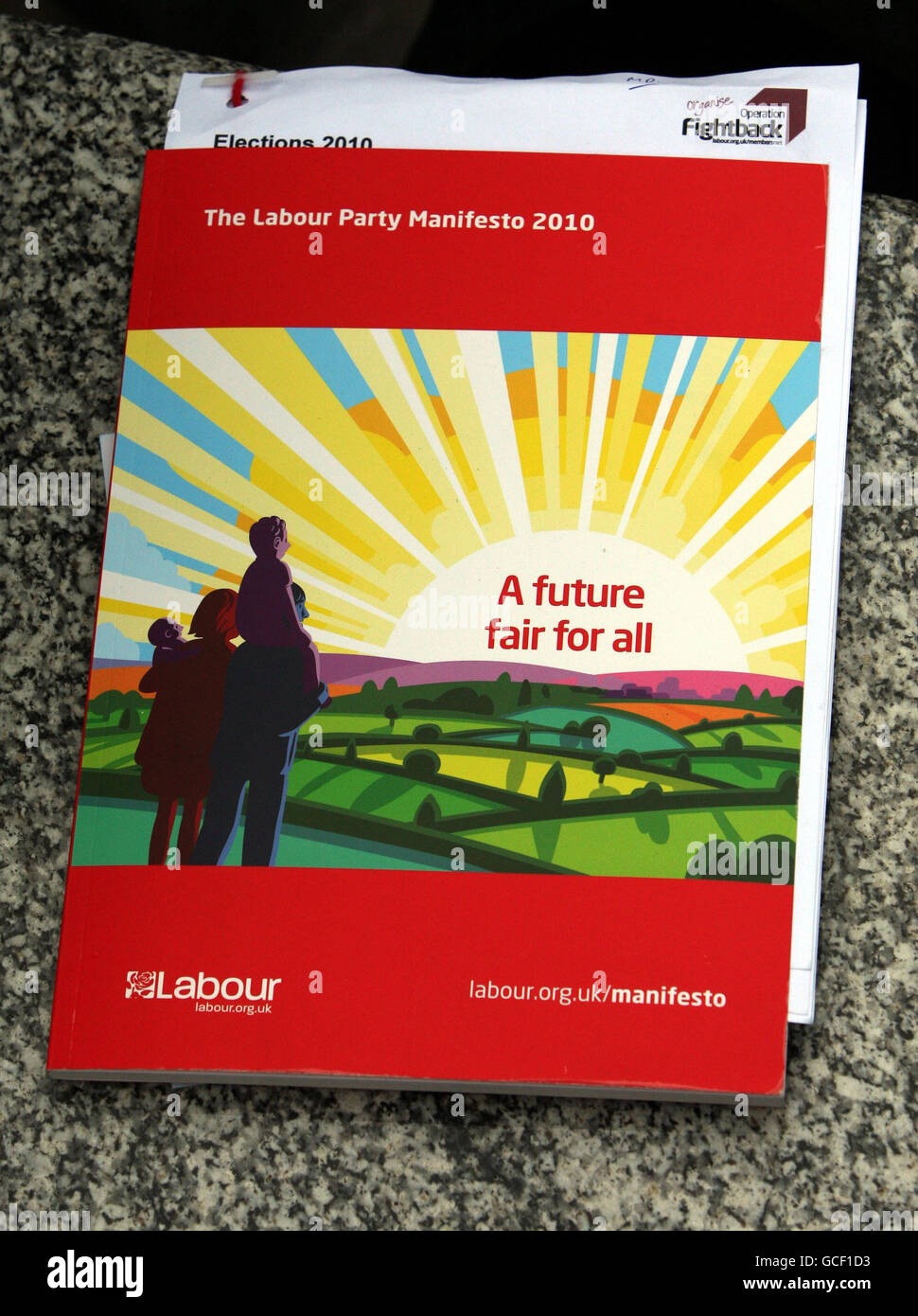 A copy of the Labour Party Manifesto 2010, is placed on the ground as ...