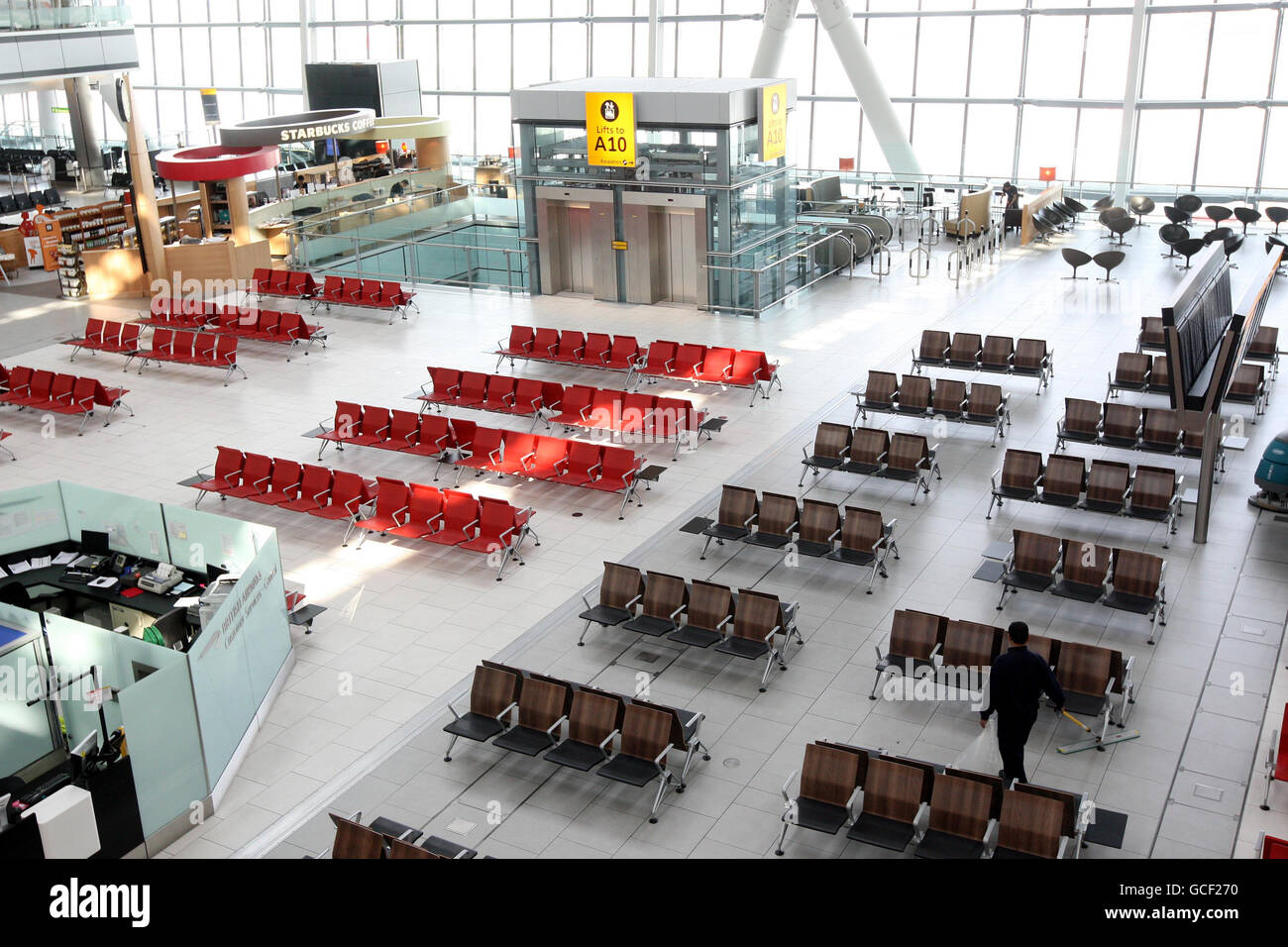 An empty Terminal 5 of Heathrow Airport in Middlesex as all non ...