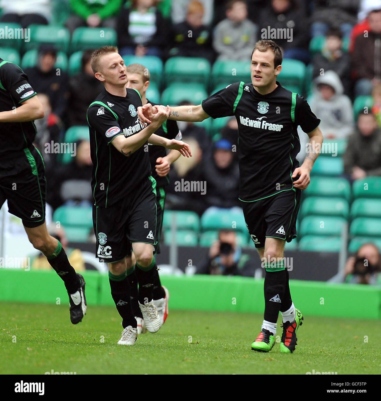 Hibernian's Anthony Stokes (right) celebrates scoring with teammate ...