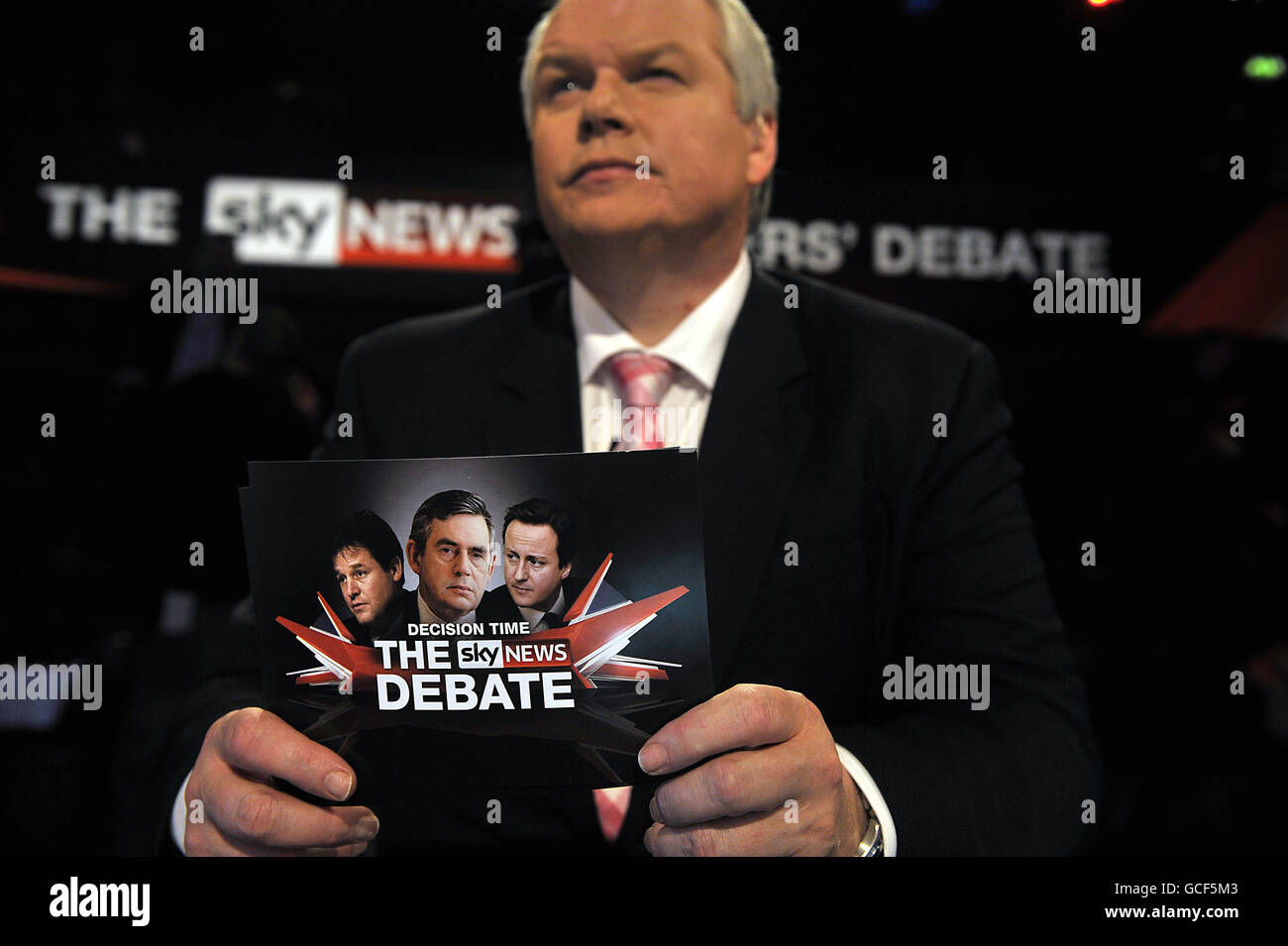 Sky News presenter Adam Boulton holds his cue-cards on the newly ...
