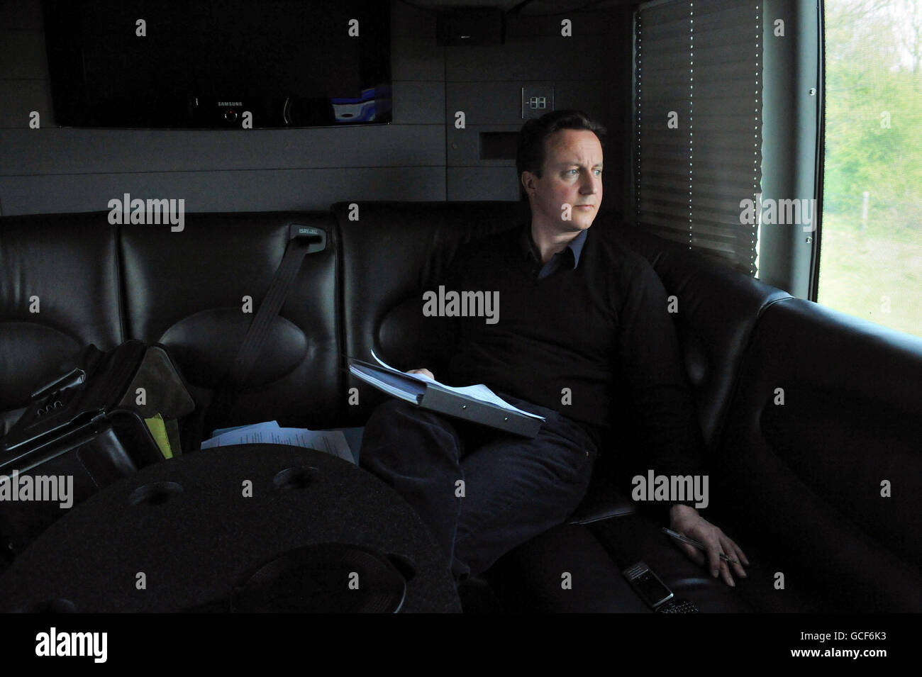 Conservative Party leader David Cameron on board the party's campaign ...