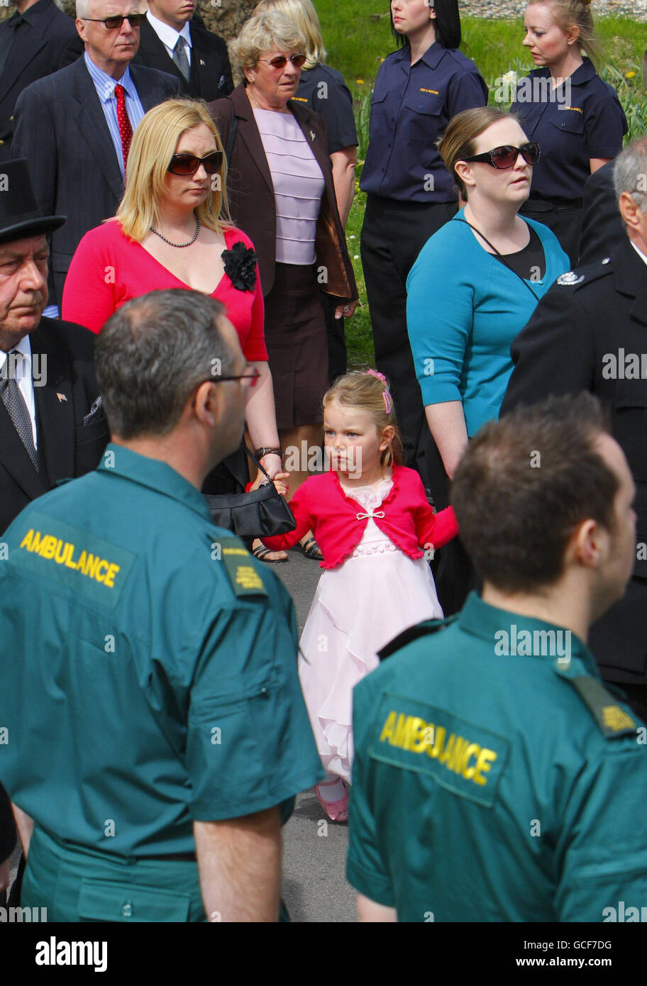Wife Charlotte Bannon (left, in pink) arrives with daughter Abigail, 5 ...
