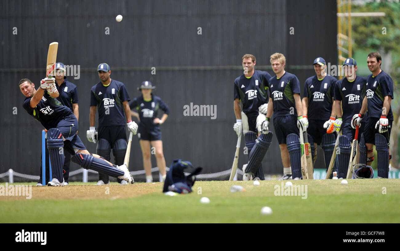 England's Tim Bresnan attempts to hit a six in a hitting competition ...