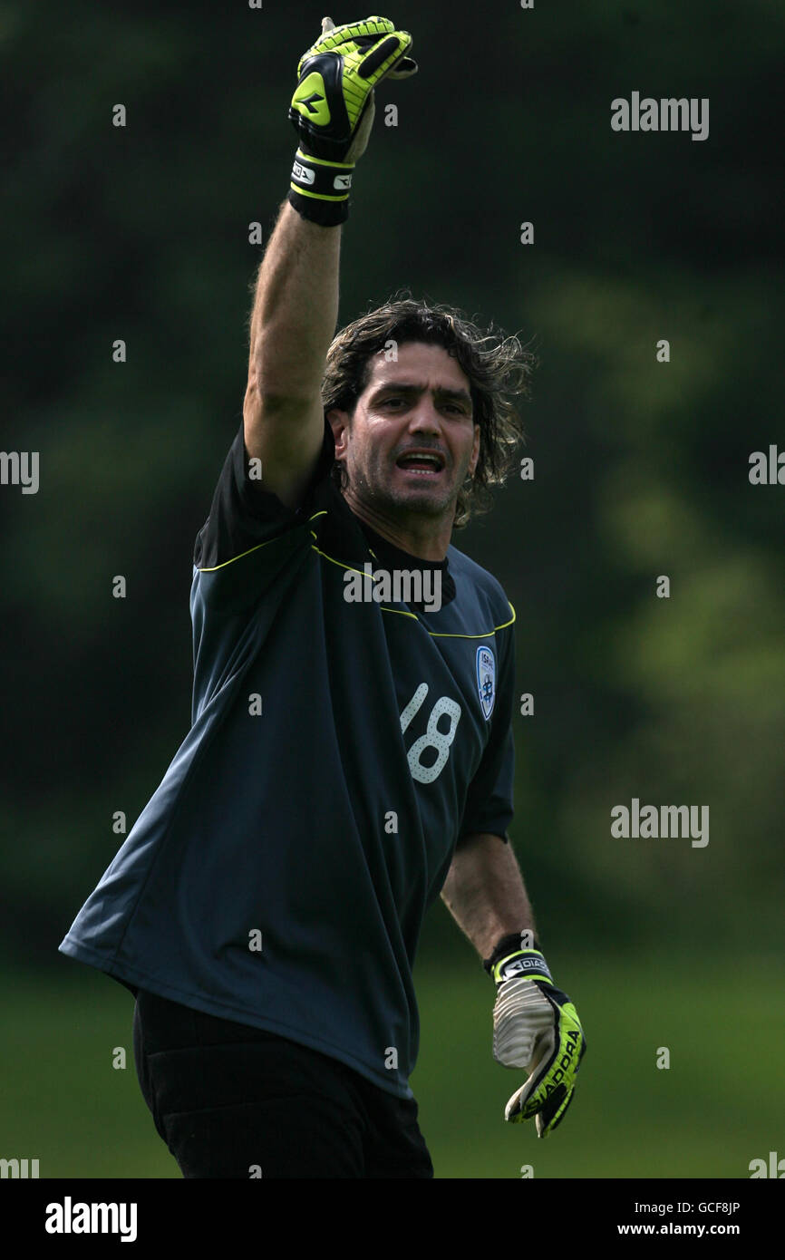 Israels' deaf goalkeeper Michael Dahan directs his team mates with sign ...