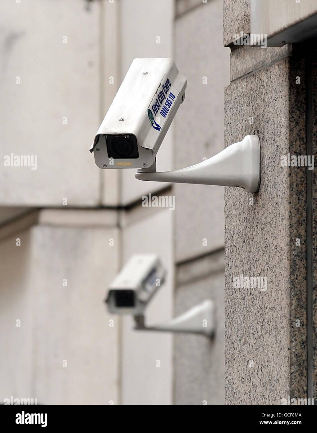 A generic picture of two CCTV cameras on the side of a building in ...