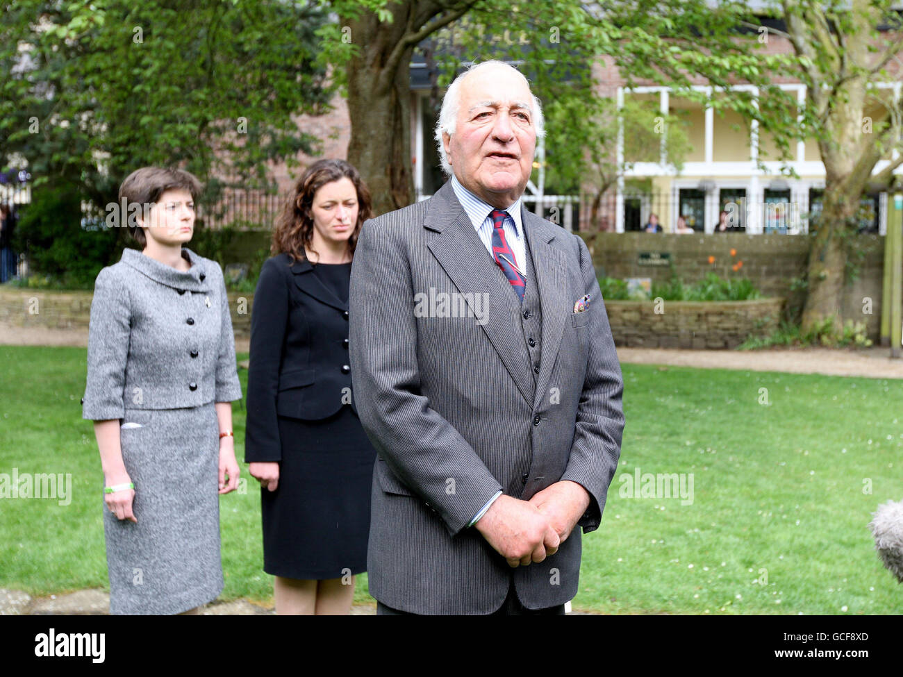 Major John Thornloe talks to the media while watched by his daughter-in ...