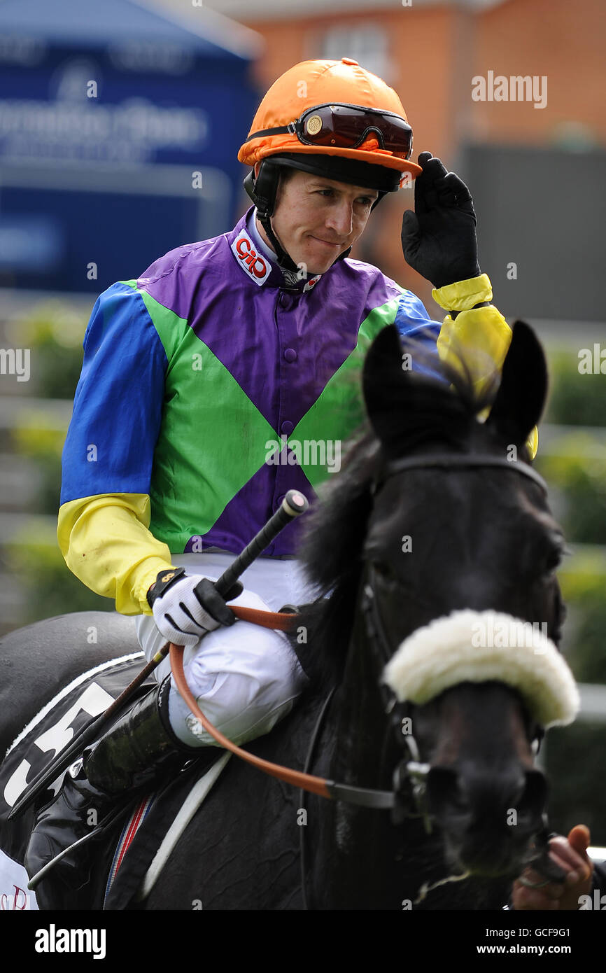 Jockey Jim Rowley on Illustrious Blue after winning the Moss Bros ...