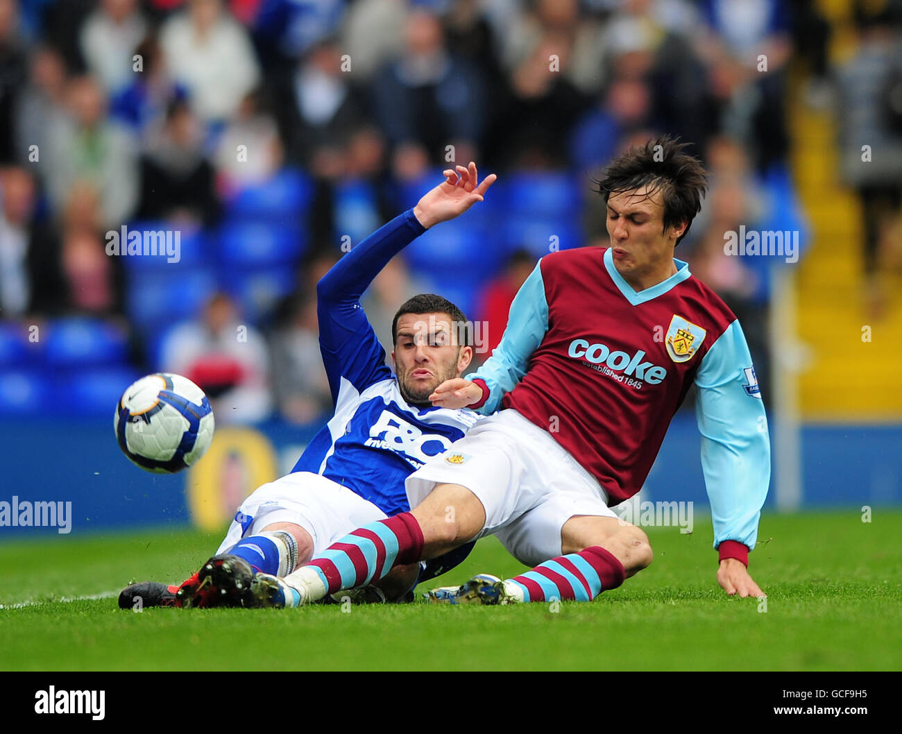 Burnley's Jack Cork (right) and Birmingham City's Stuart Parnaby (left ...