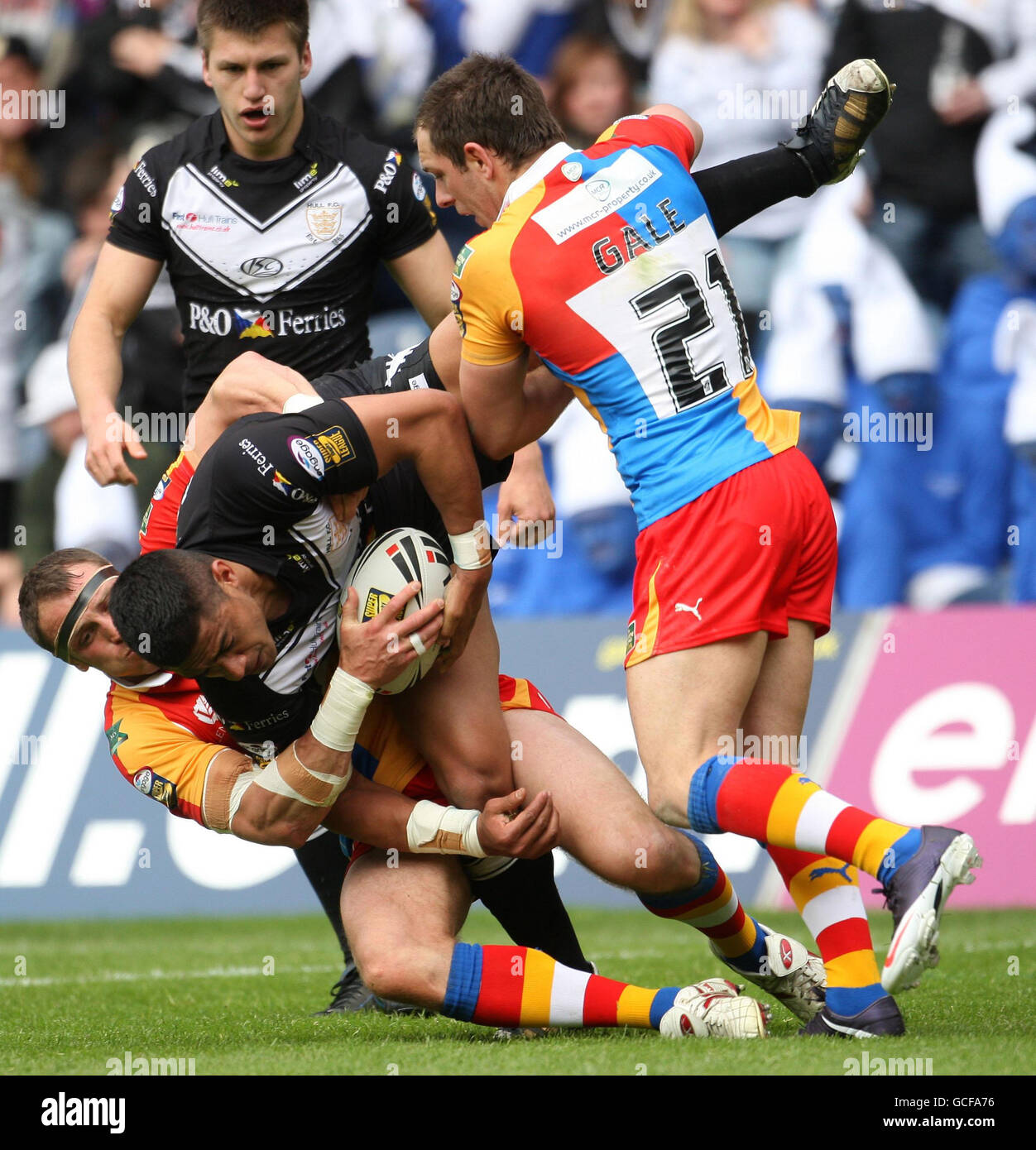 Hull FC's Willie Manu and Harlequin's Rob Purdham and Luke Gale during ...
