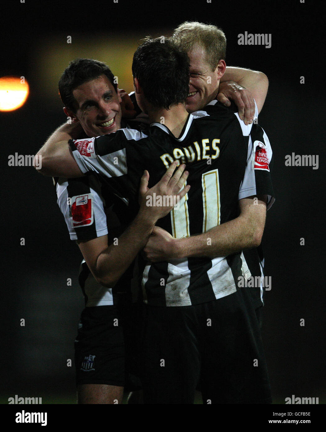Notts County's John Thompson, Ben Davies and Ricky Ravenhill celebrate ...