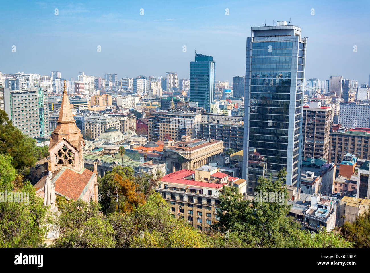 View of downtown Santiago, Chile with a church and statue in the ...