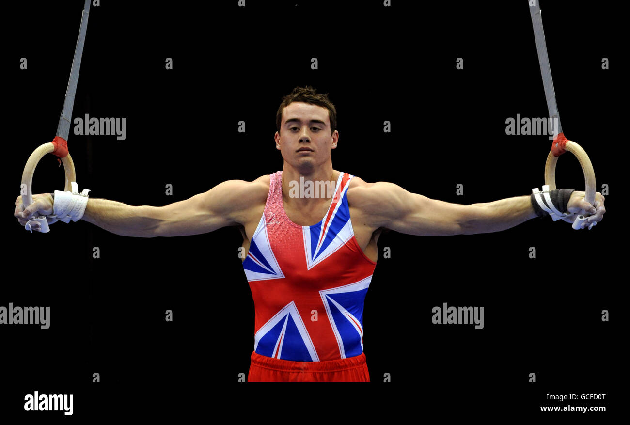 Great Britain's Kristian Thomas practices on the rings during the ...
