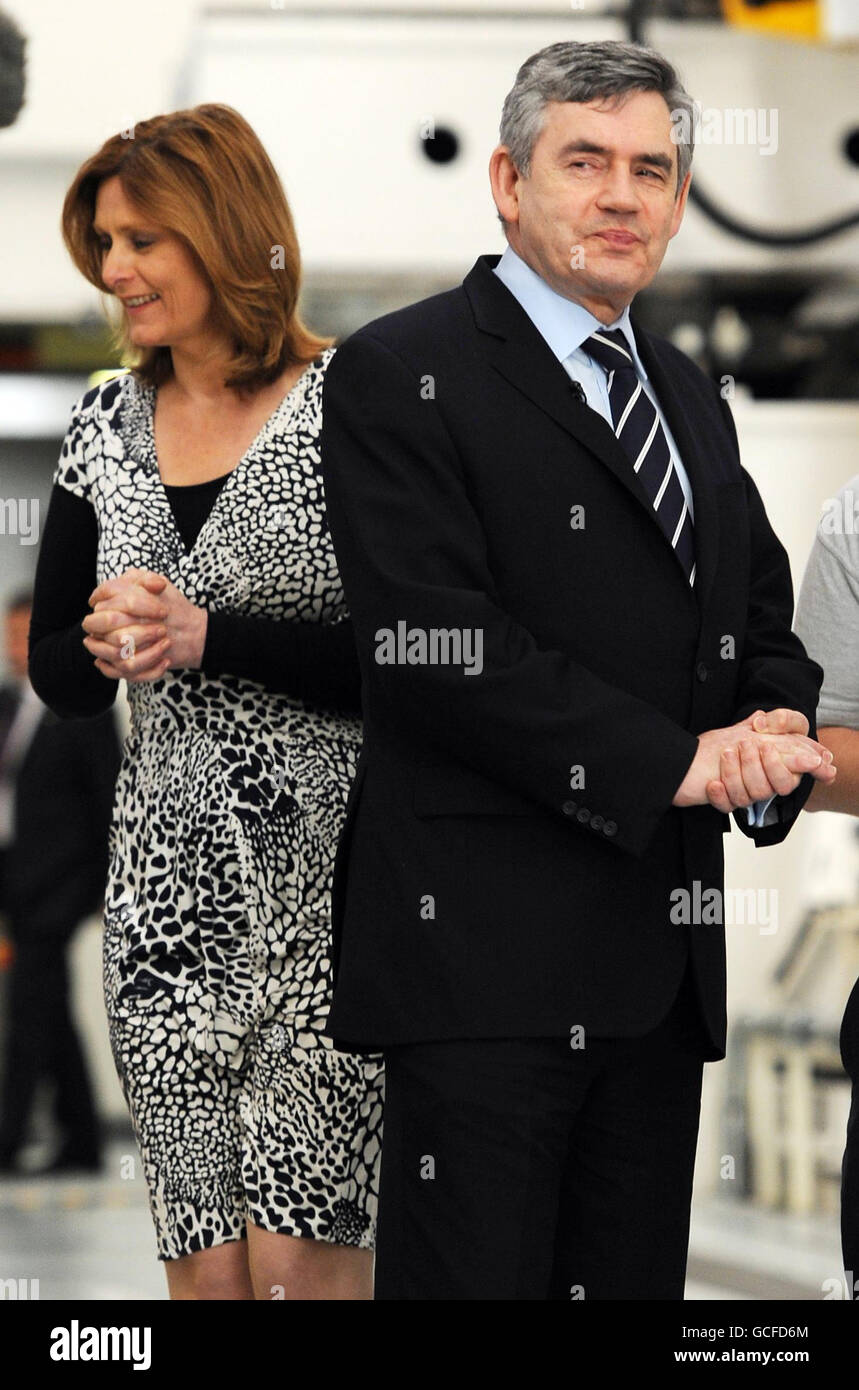 Prime Minister Gordon Brown, with his wife Sarah, speaks to staff and ...