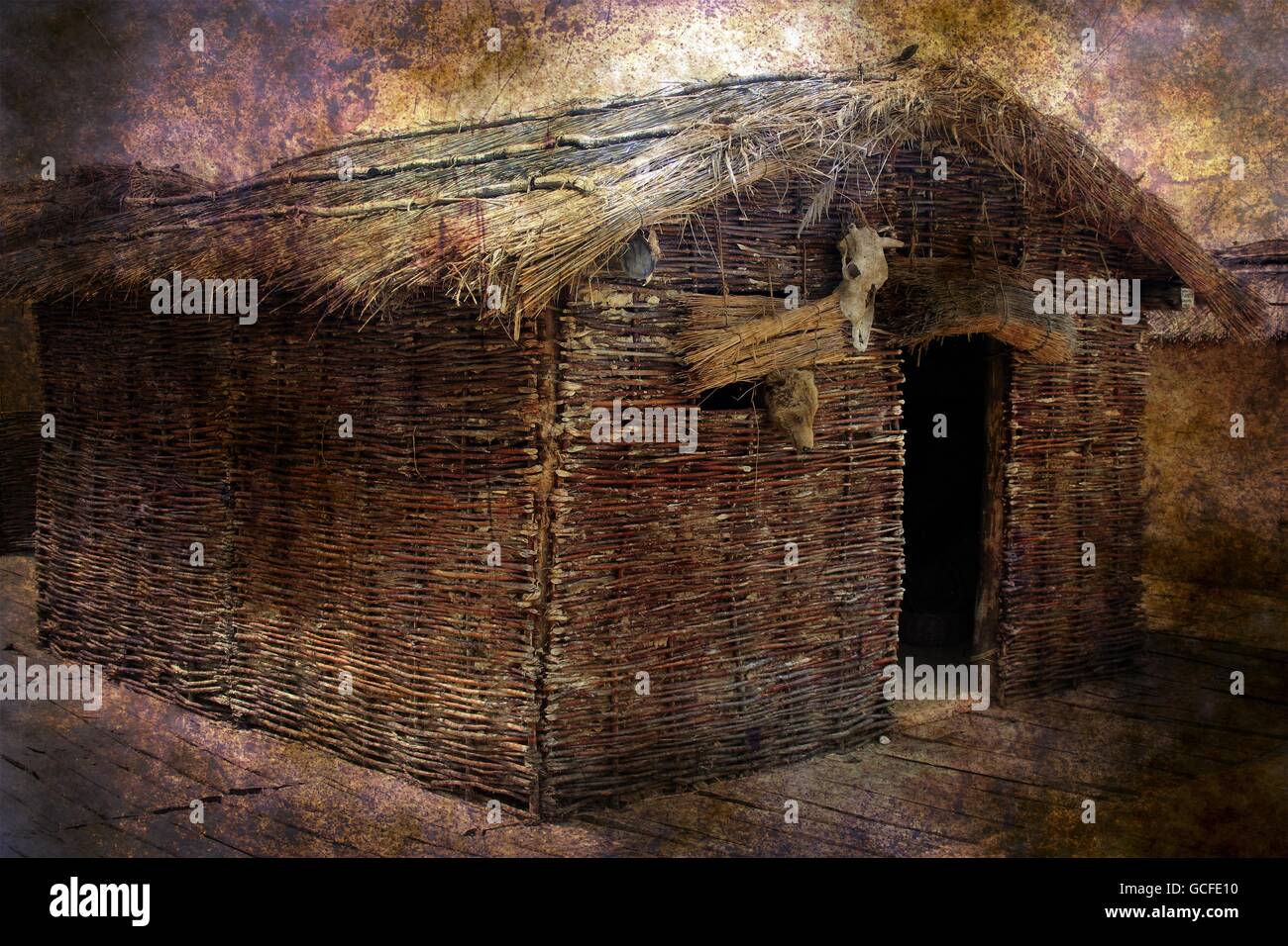 Straw house grunge concept Stock Photo - Alamy