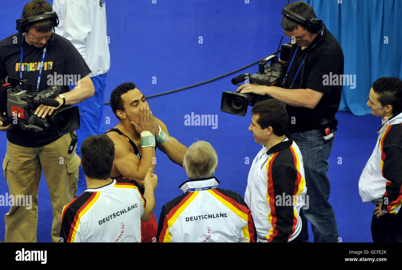 Germany's Matthias Fahrig celebrates winning gold on the floor during ...