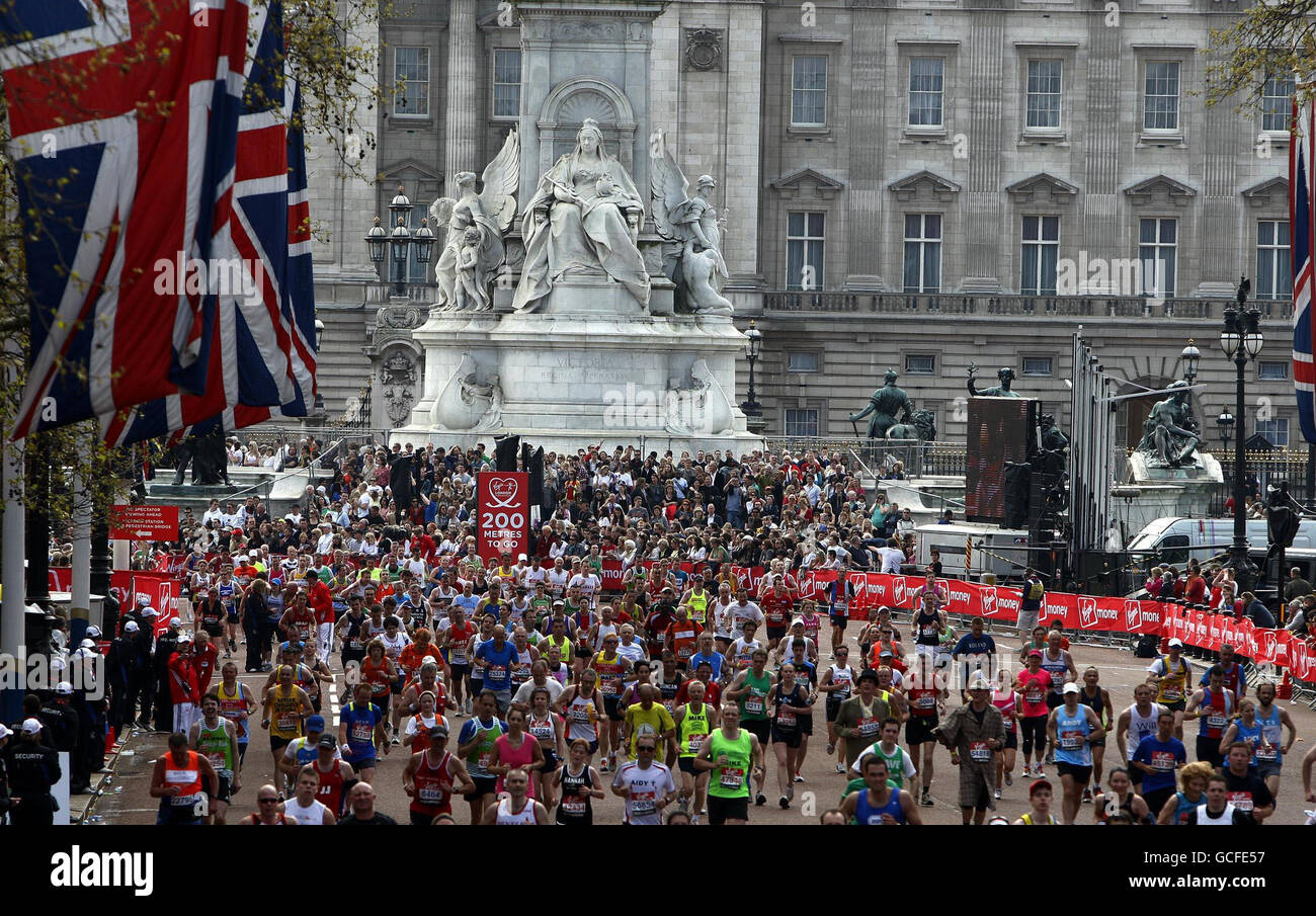 London Marathon 2010. Massed runners at the finish on The Mall during ...