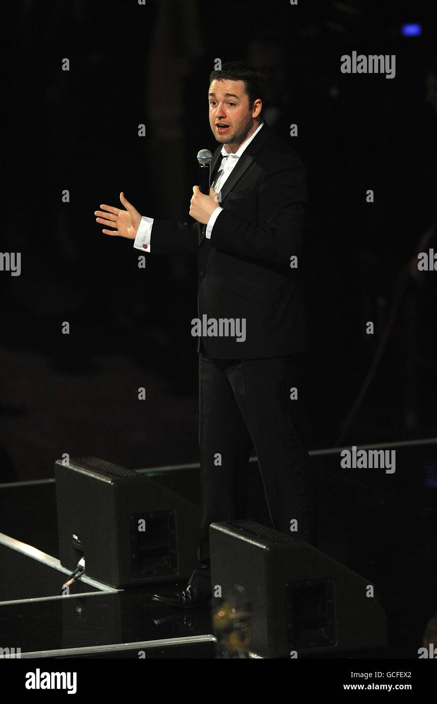 Comedian Jason Manford performs on stage at the PFA Player of the Year ...