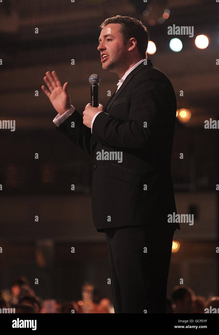 Comedian Jason Manford performs on stage at the PFA Player of the Year ...