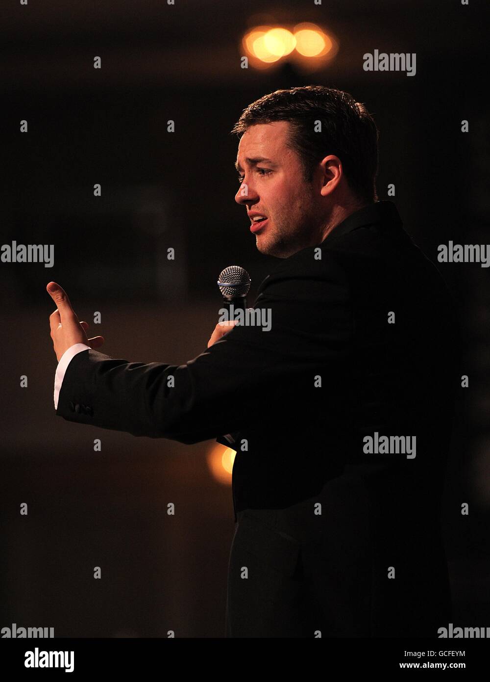 Comedian Jason Manford performs on stage at the PFA Player of the Year ...