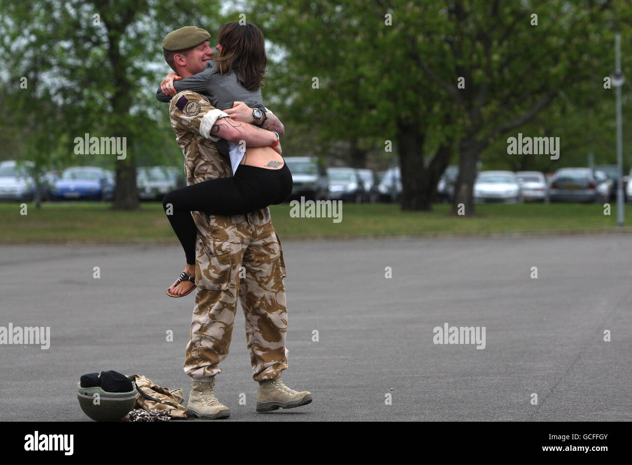 Lance corporal Christopher Dean is reunited with wife Natasha as ...