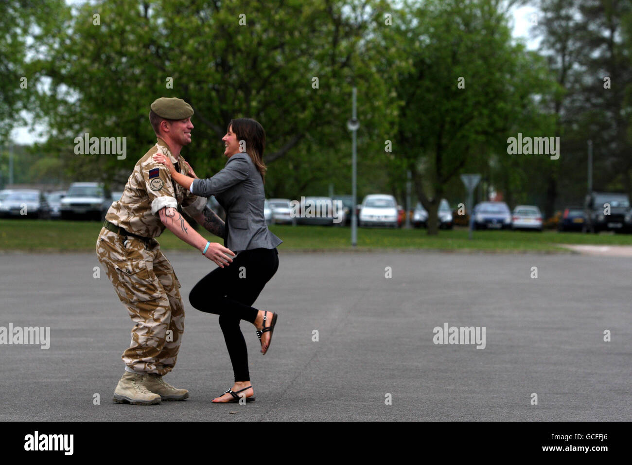 Lance corporal Christopher Dean is reunited with wife Natasha as ...