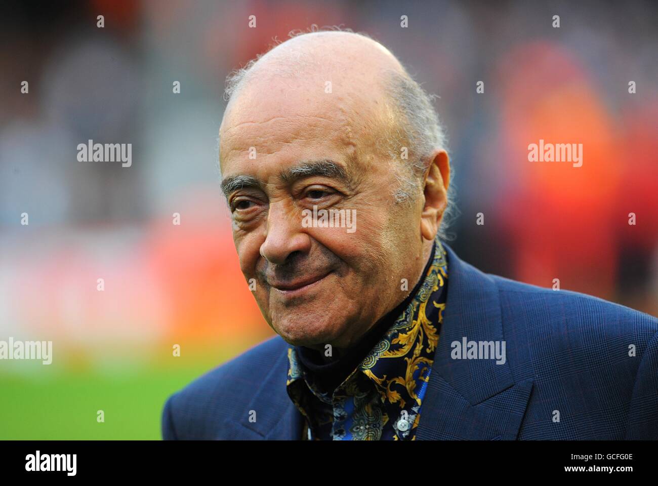 Fulham owner mohamed al fayed on the pitch hi-res stock photography and ...