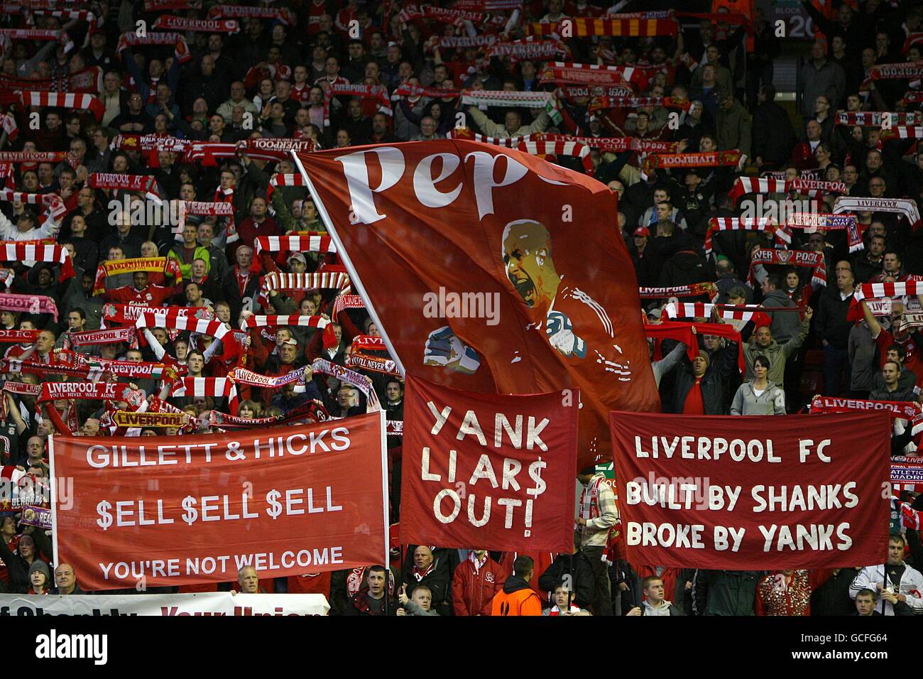 Liverpool fans protest in the stands with banners against their owners ...