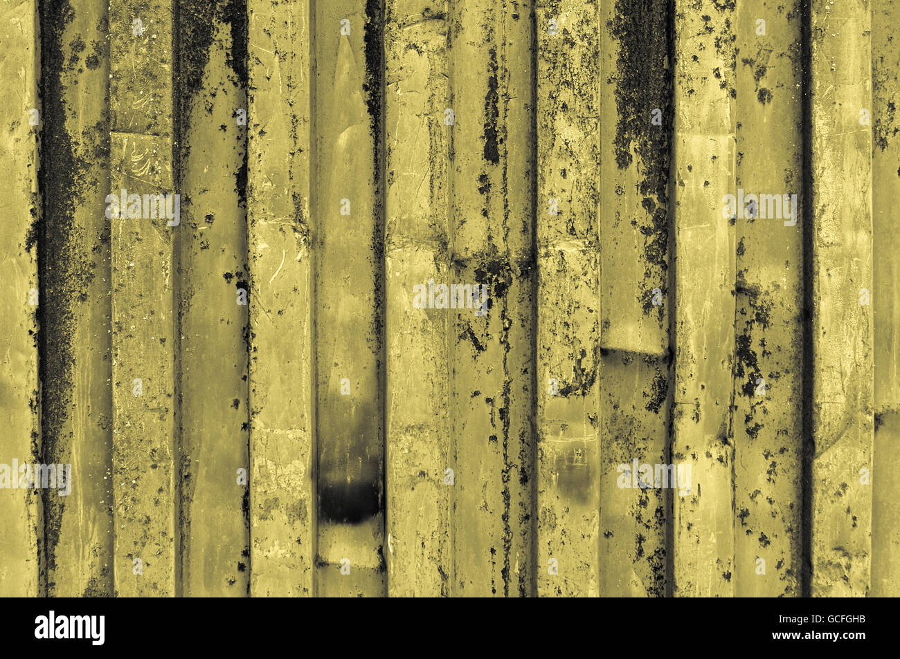 rough and rusty corrugated yellow grayish yellowish iron metal surface ...